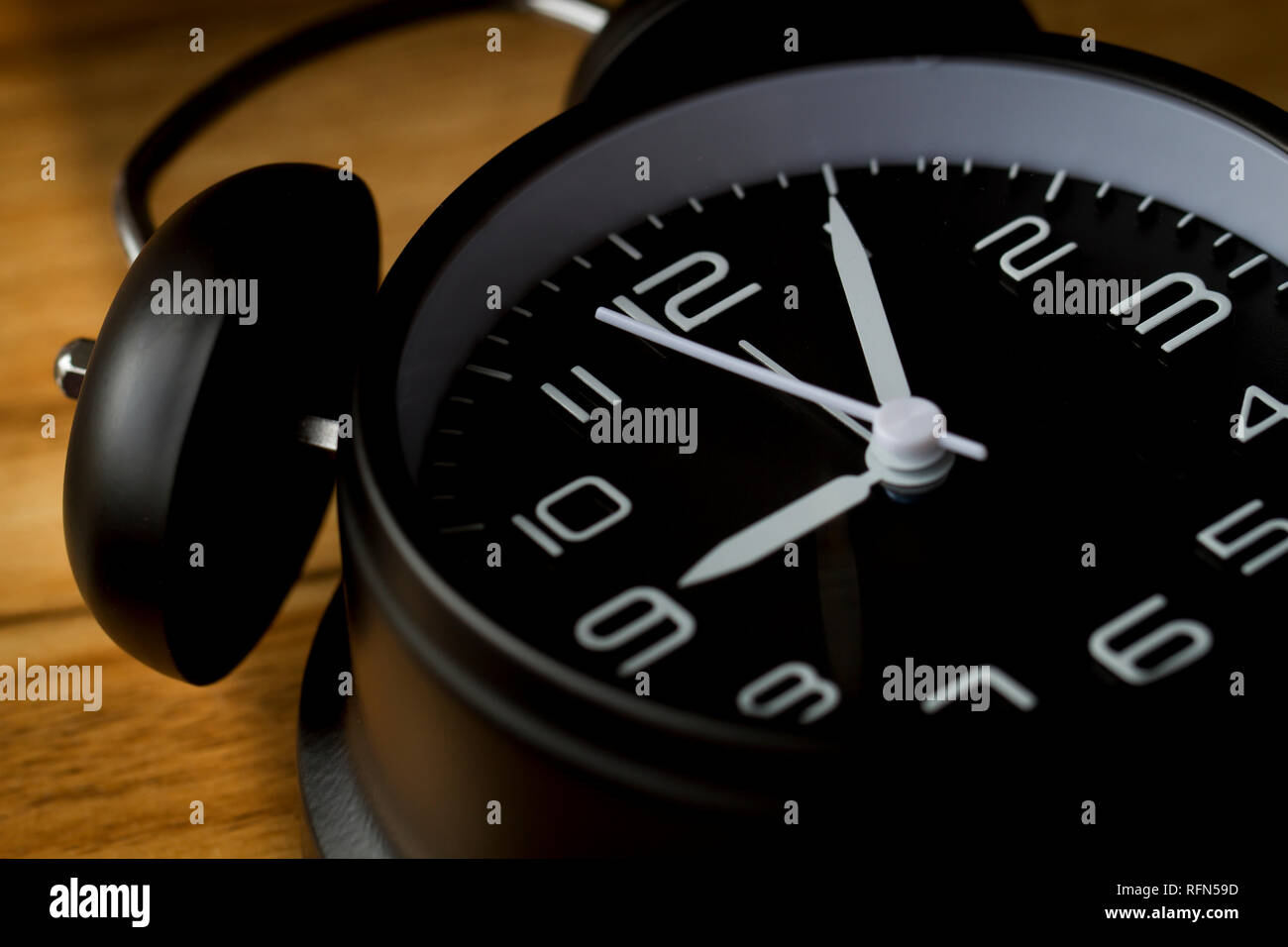 Black alarm clock Stock Photo - Alamy