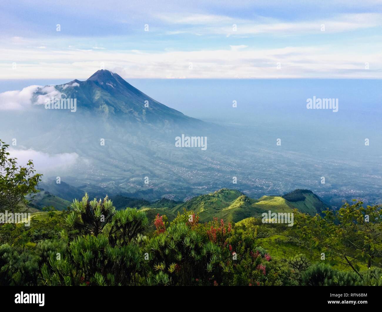 Double Summit Mount Merapi and Mount Merbabu experience Stock Photo - Alamy