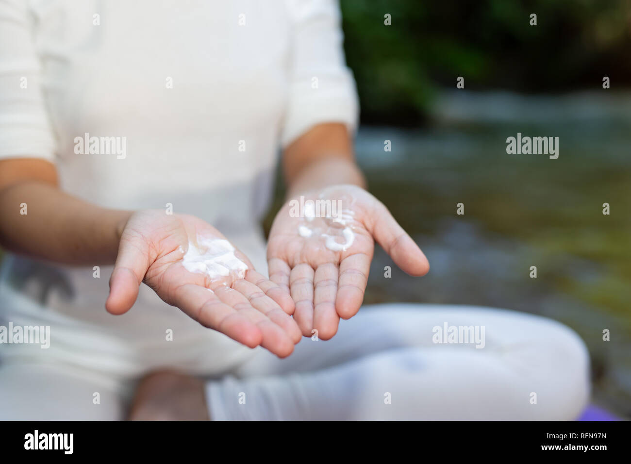 Mosquito repellent. Women are using insect repellent cream in the ...