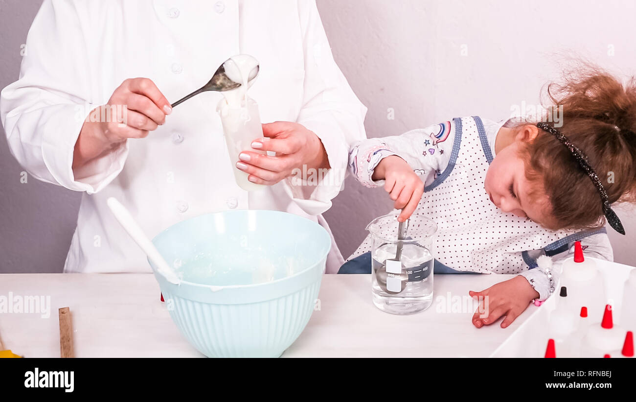Step by step. Mixing royal icing to decorate sugar cookies Stock Photo ...