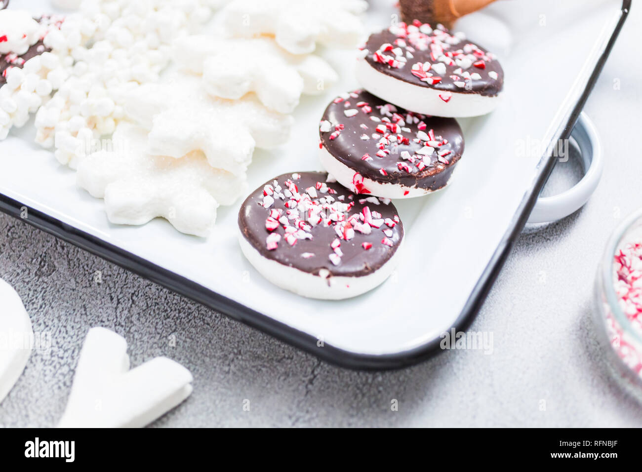 Close up view. Variety of marshmallow toppings with peppermint and ...