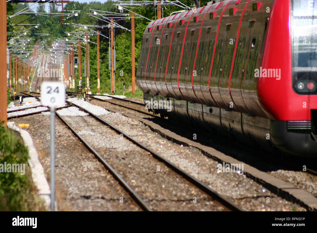 red train in the station Stock Photo - Alamy