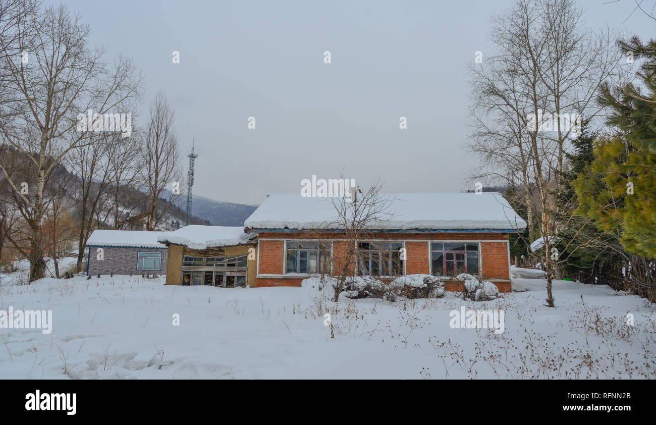 Old rural house at snow village in Mohe County, China Stock Photo - Alamy