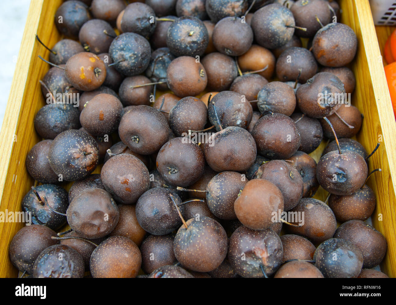 Frozen pear fruits at local market in Mohe County, China Stock Photo ...