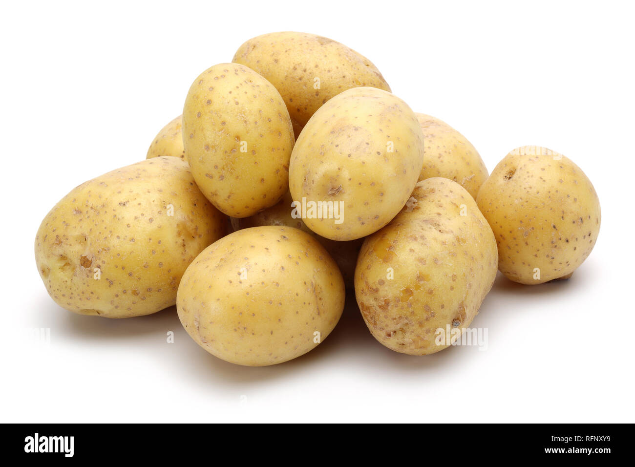 Heap of fresh potatoes isolated on white background Stock Photo - Alamy