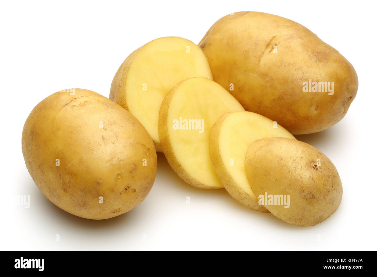 Fresh potato and slice isolated on white background Stock Photo - Alamy