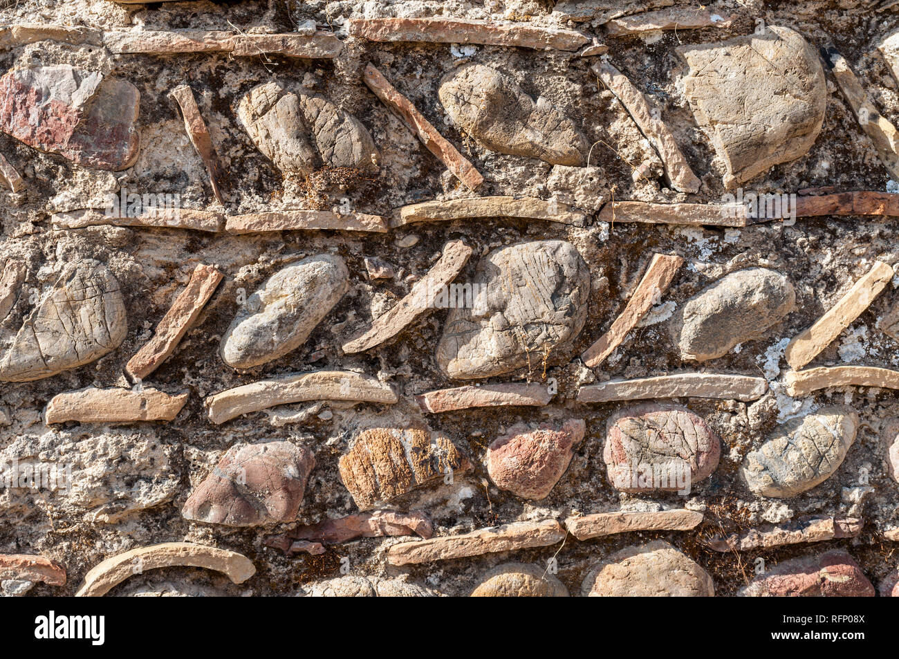 Detail of unusual ancient greek rock wall design and pattern near the ...