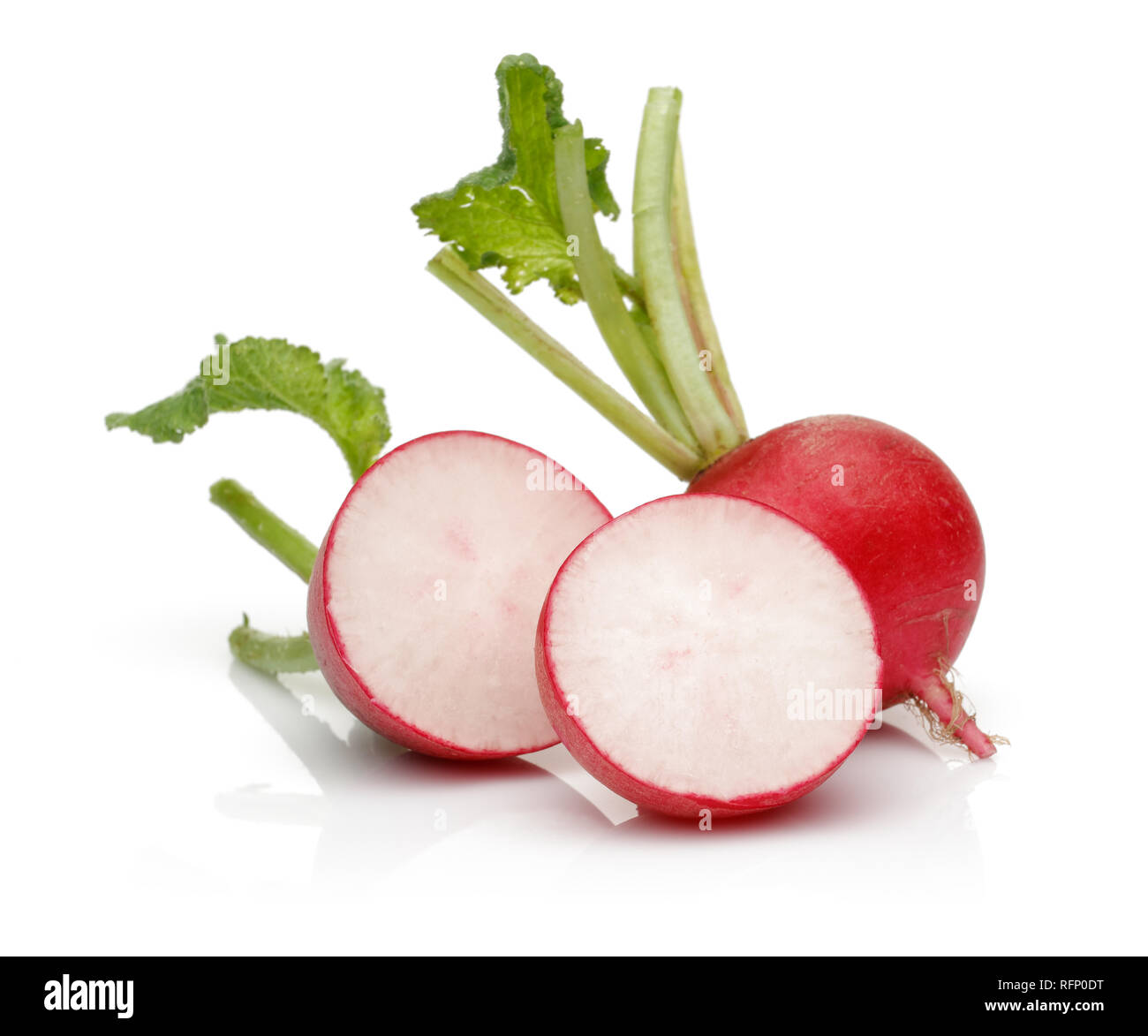 Red radish and green leaves isolated on white background Stock Photo ...