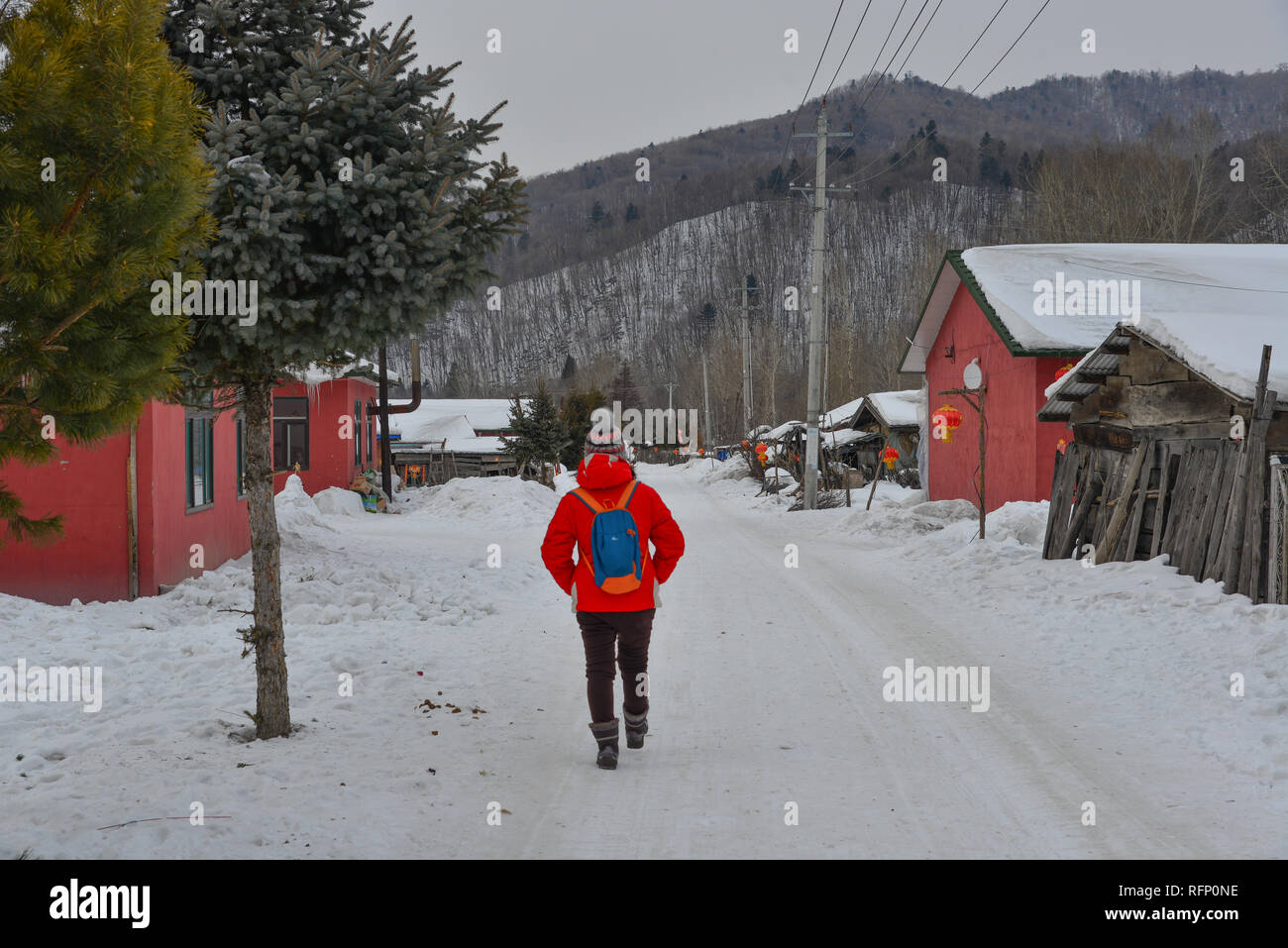 Harbin, China - Feb 24, 2018. A woman walking on main street of ...