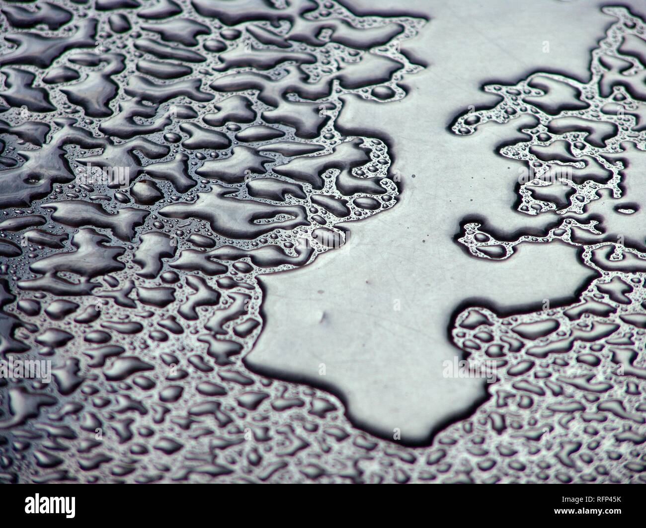 Raindrops on a piece of metal Stock Photo - Alamy