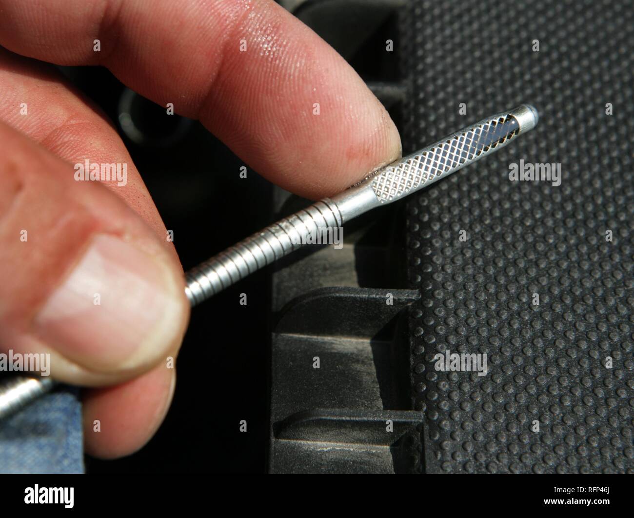Car maintenance, oil level control, dipstick Stock Photo - Alamy