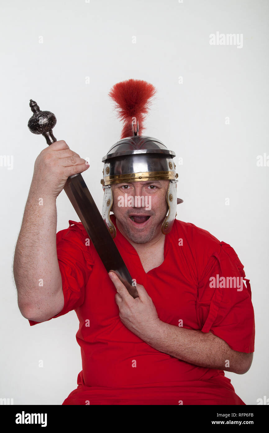 A roman soldier with with a sword on the white background Stock Photo ...