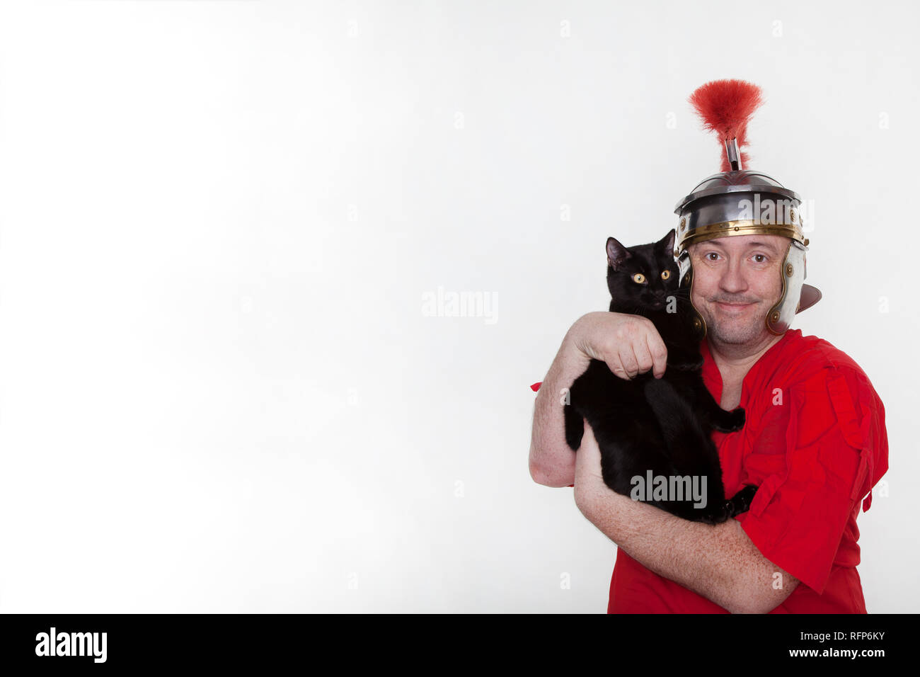A roman soldier with a black cat on the white background Stock Photo ...