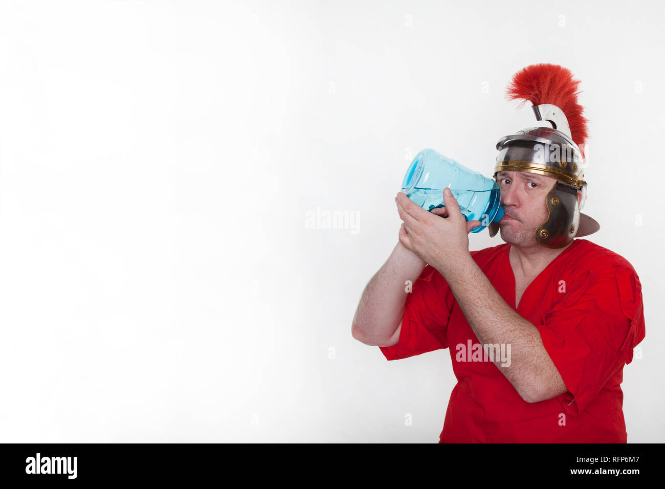 A roman soldier drink from the water bottle on the white background ...