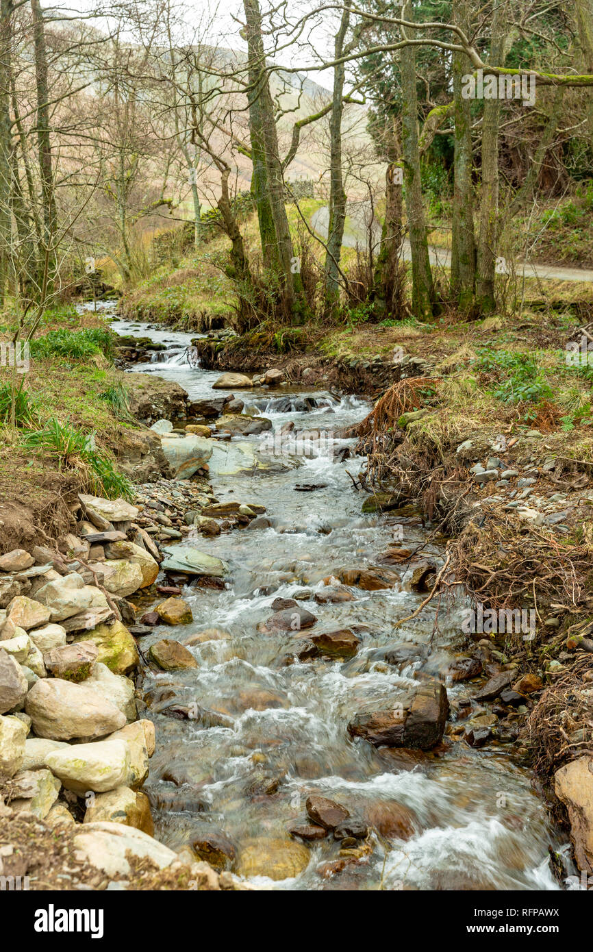 Stream flowing into lake ullswater, Lake District national park,Cumbria ...