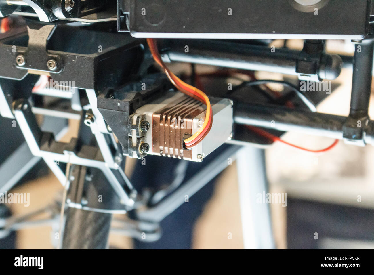 Modern electronic parts of drone uav with colorful details and wires ...