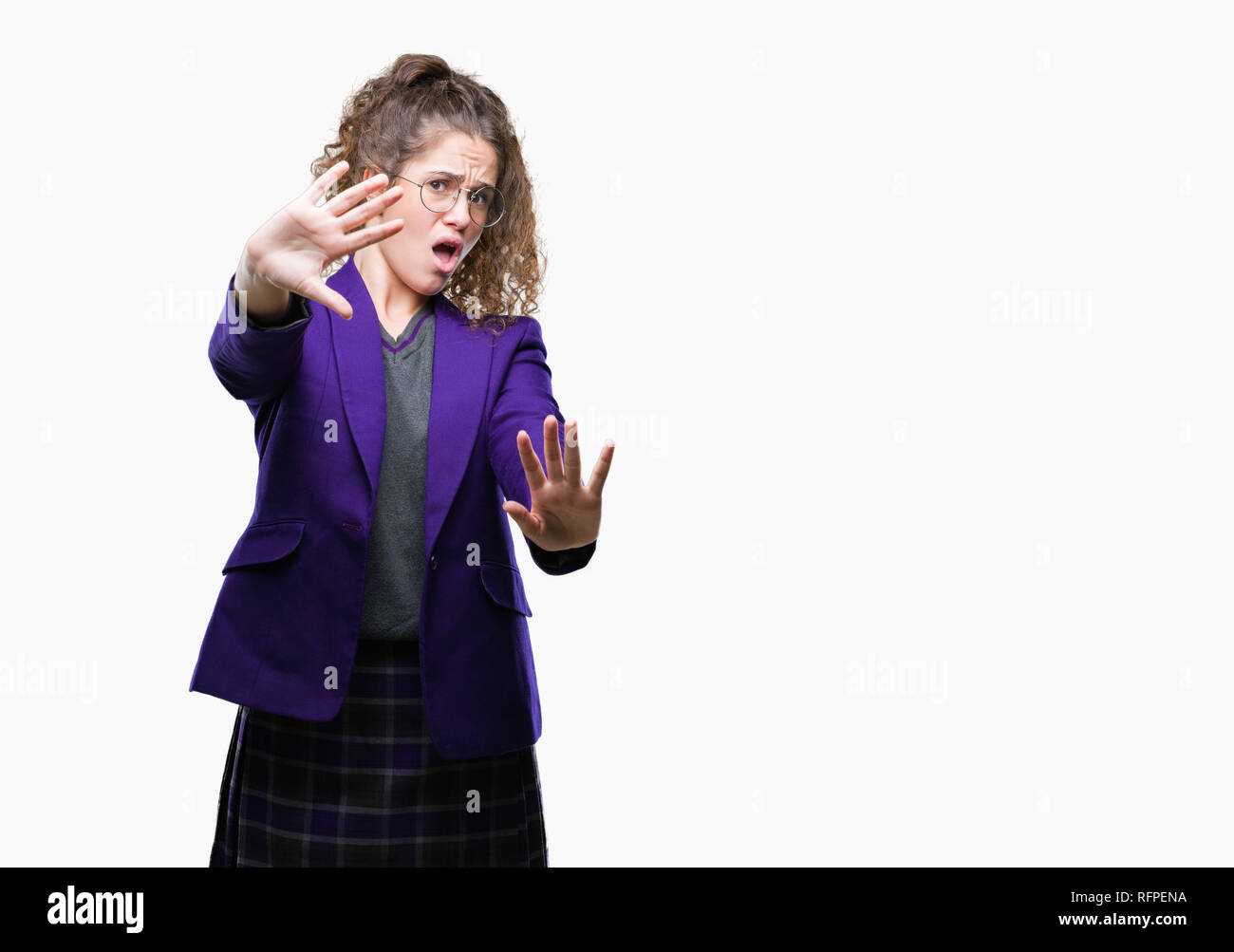 Young brunette student girl wearing school uniform and glasses over ...