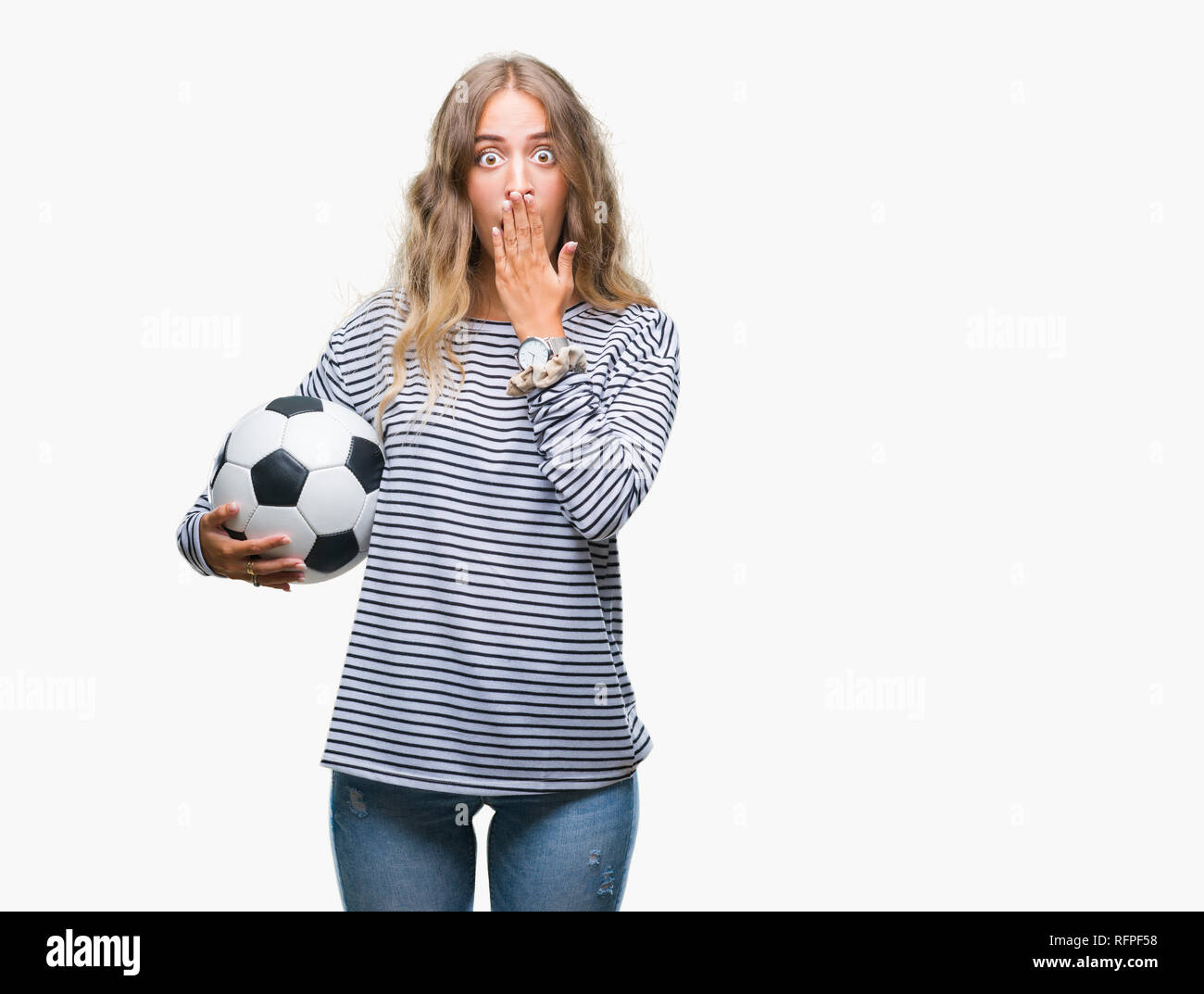 Beautiful young blonde woman holding soccer football ball over isolated ...