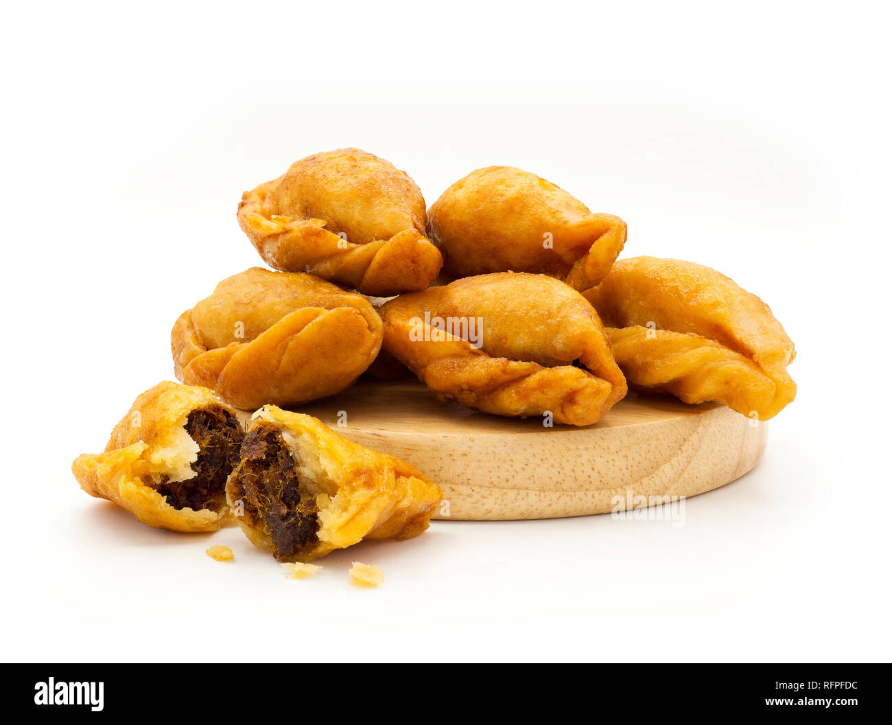 Packshot close up view of "Pan Klib" traditional mini Thai puff dessert ...