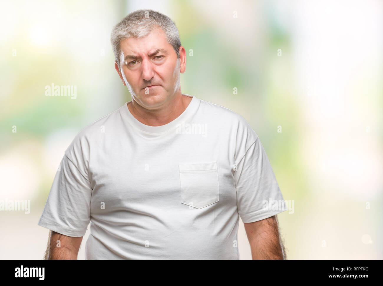 Handsome senior man over isolated background depressed and worry for ...