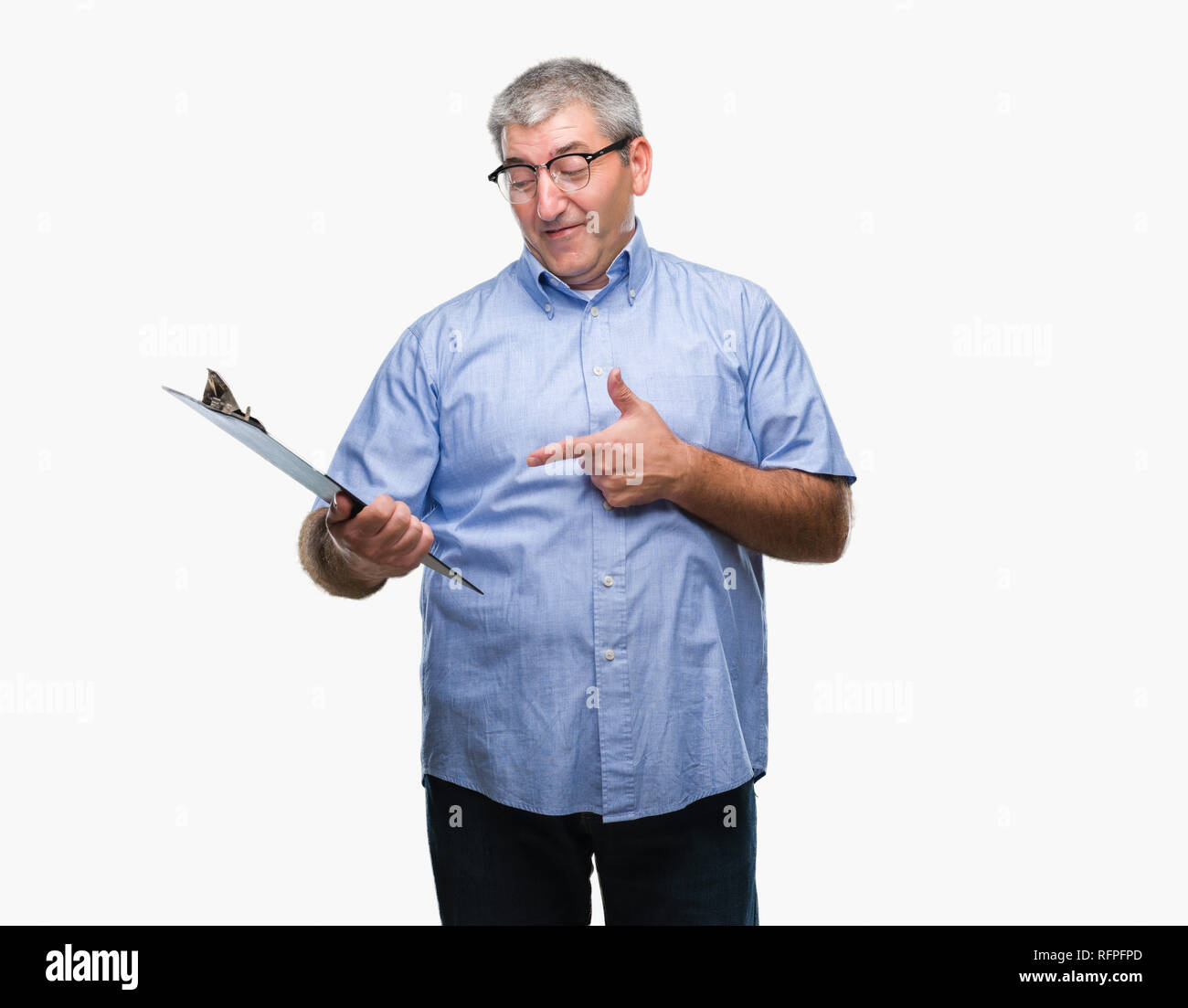 Handsome senior inspector man holding clipboard over isolated ...