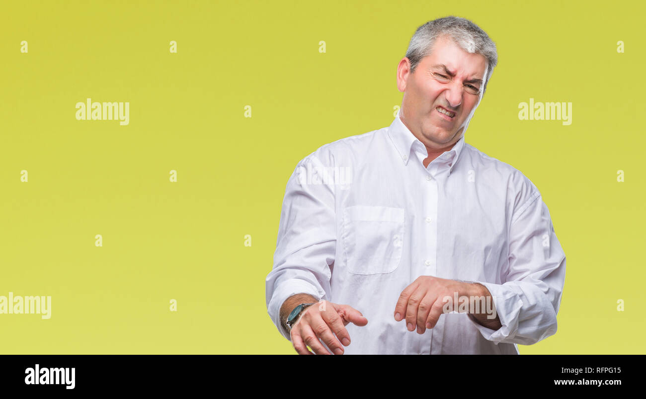 Handsome senior man over isolated background disgusted expression ...