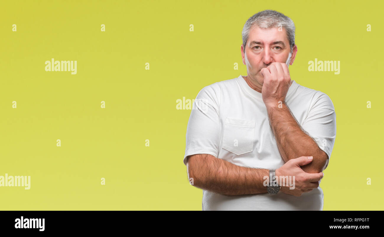 Handsome senior man over isolated background looking stressed and ...