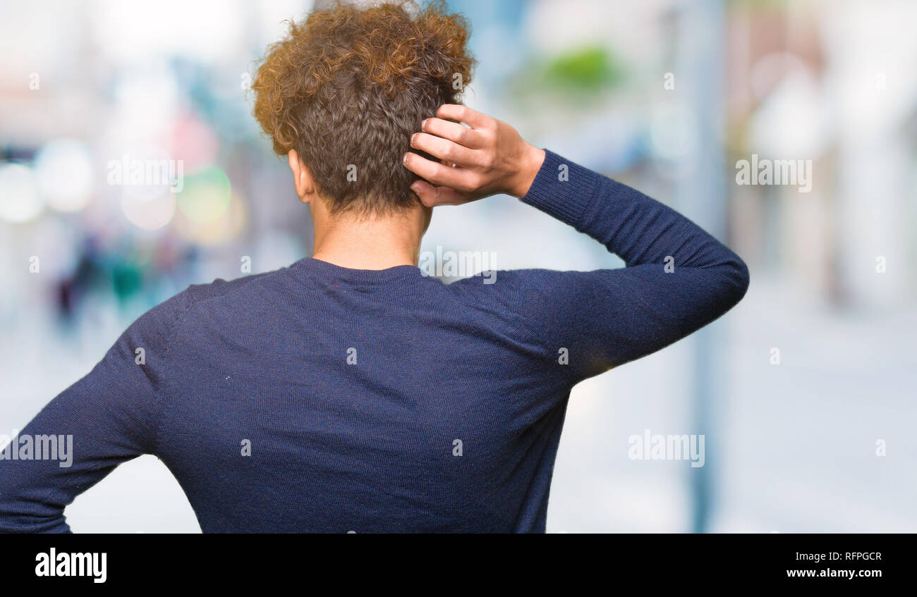 Young arab man standing doubt hi-res stock photography and images - Alamy