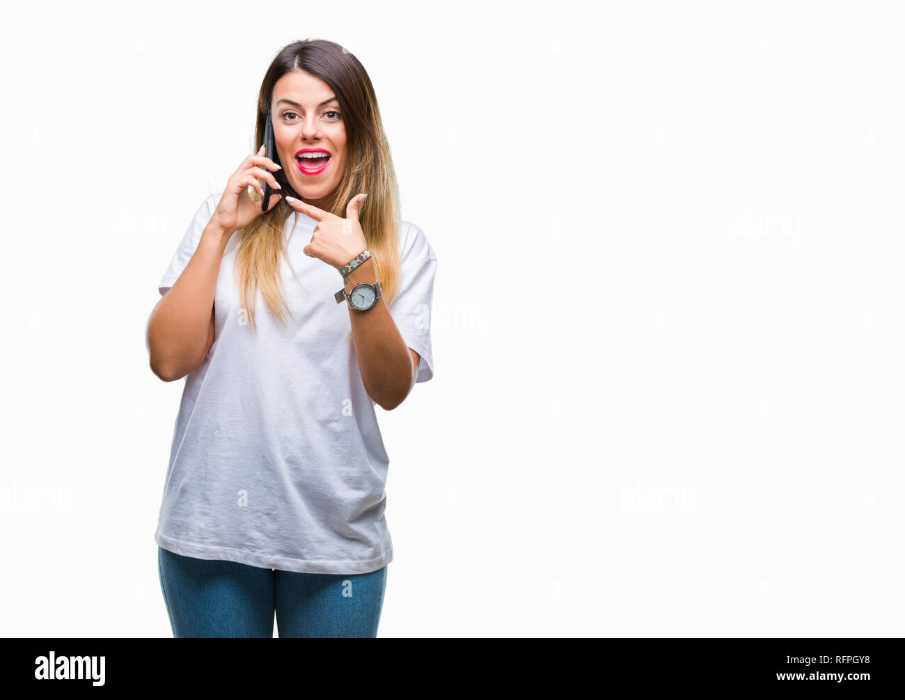 Young beautiful woman speaking calling using smartphone over isolated ...