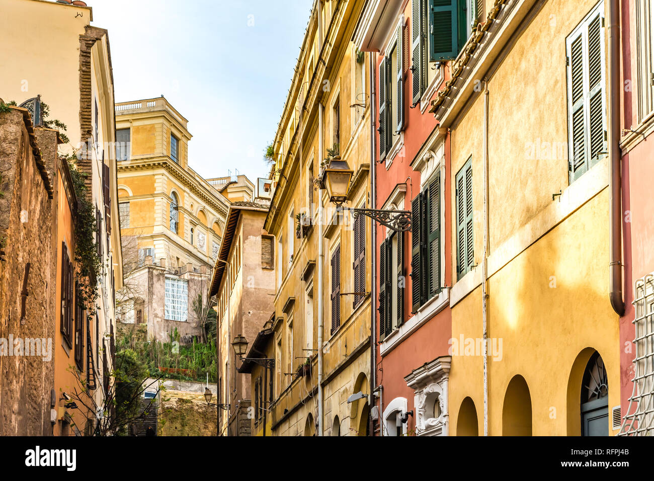 typical ancient buildings in fascinating street of Rome Stock Photo - Alamy