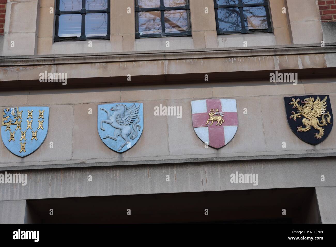 Shields on Building. England Stock Photo - Alamy