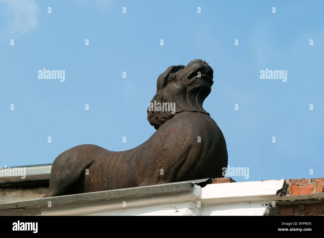 Cast iron sculpture of the beast in the city. Sculpture dog decoration ...