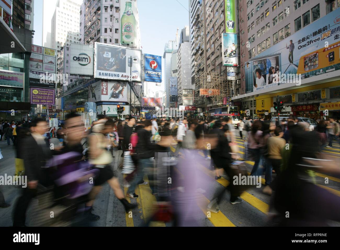 Pedestrians crossing road wan chai hi-res stock photography and images - Alamy