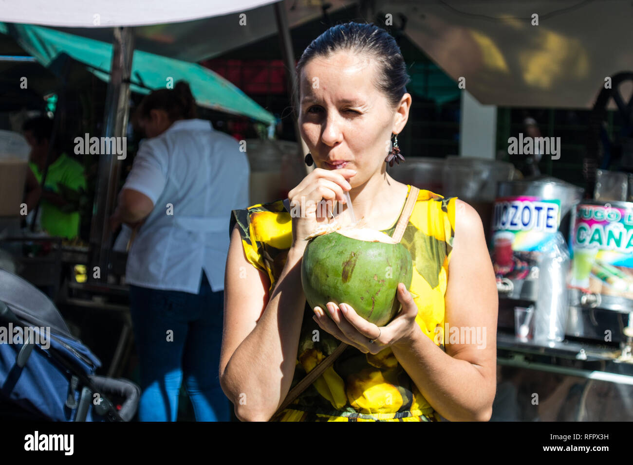 Drinking coconut juice hi-res stock photography and images - Alamy