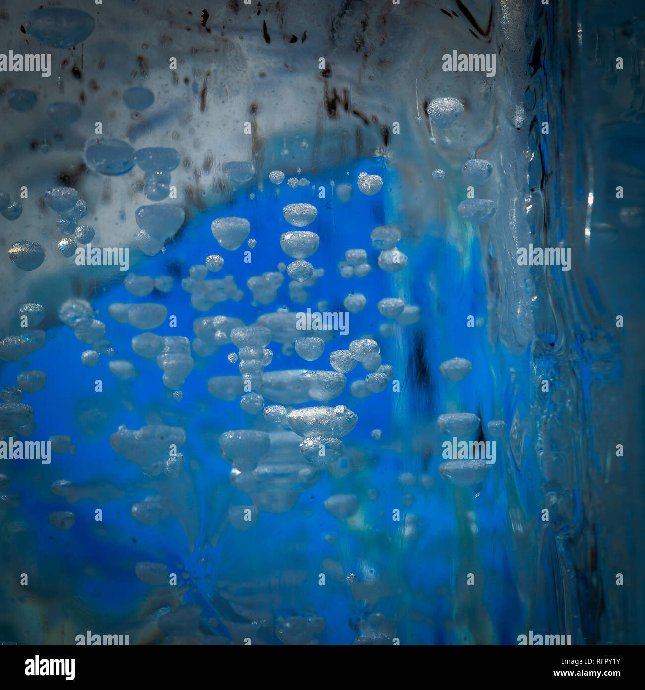 Gas Bubbles Trapped in Solid Ice Blocks Stock Photo - Alamy
