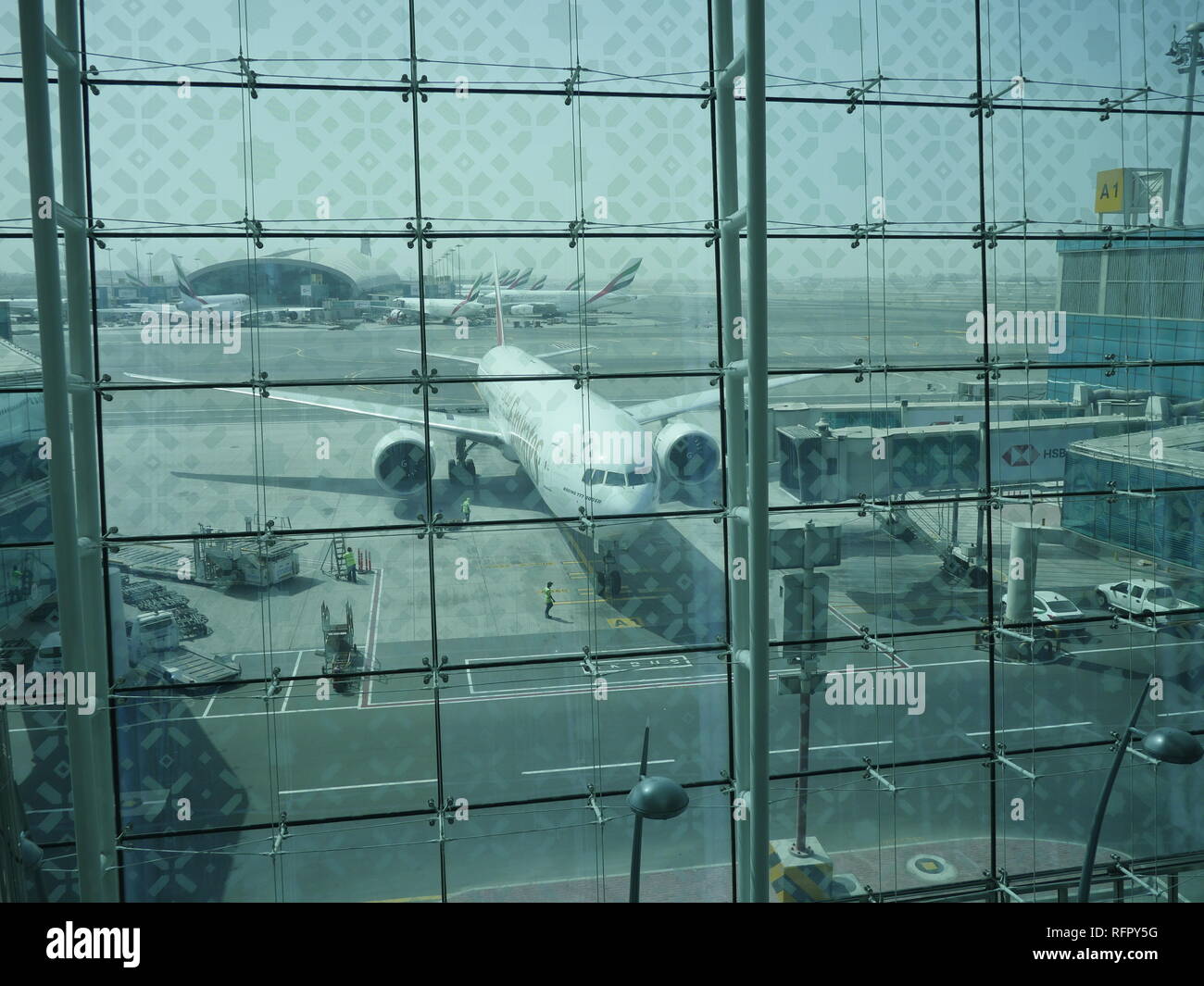Dubai airport view of Emirates airline on tarmac in front of departure ...