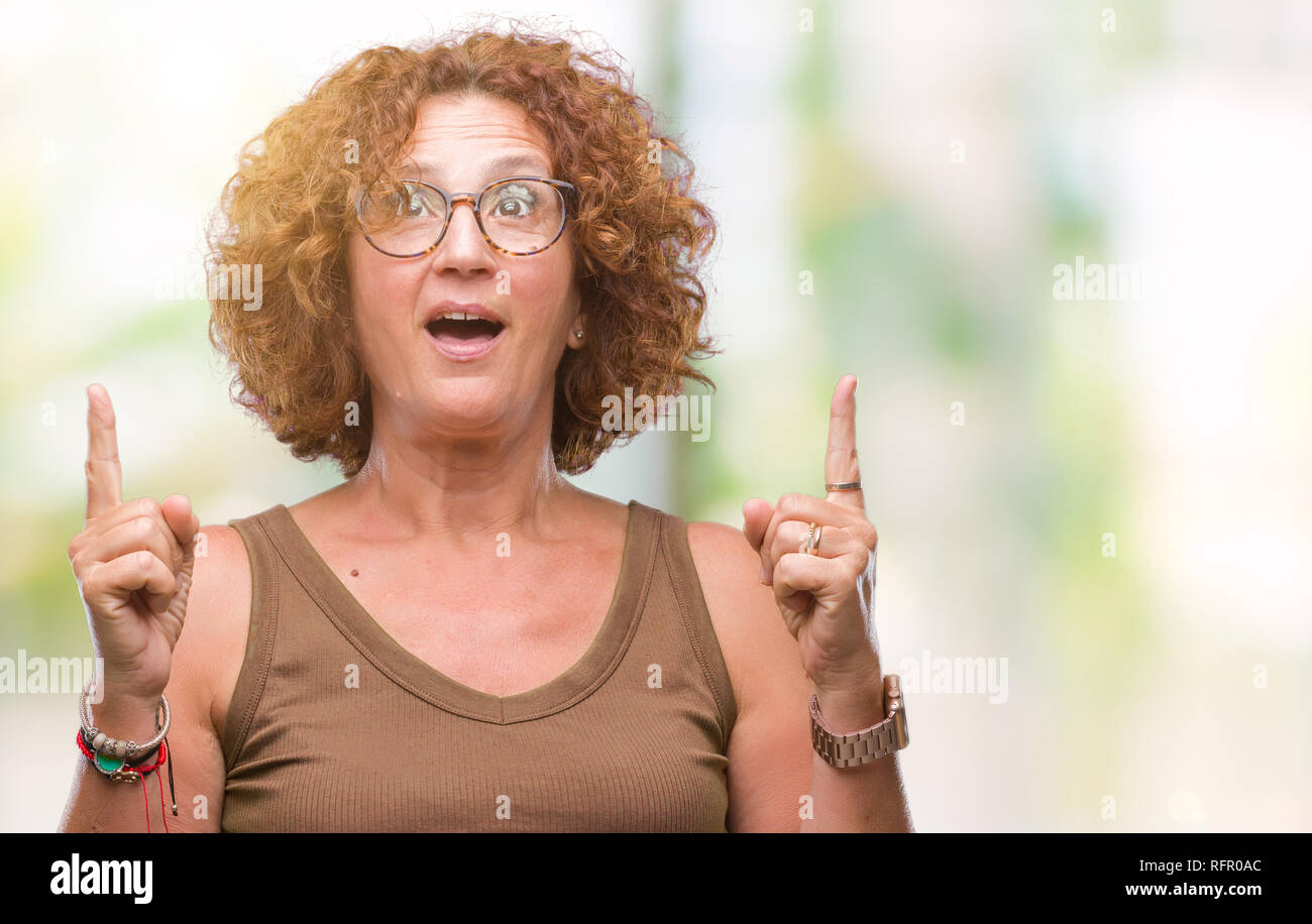 Middle Age Hispanic Woman Wearing Glasses Over Isolated Background