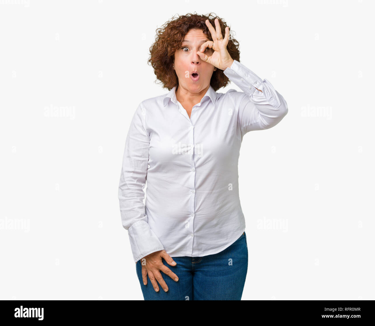 Beautiful middle ager senior businees woman over isolated background ...