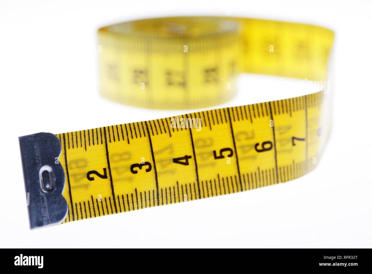 Unrolled measuring tape hi-res stock photography and images - Alamy