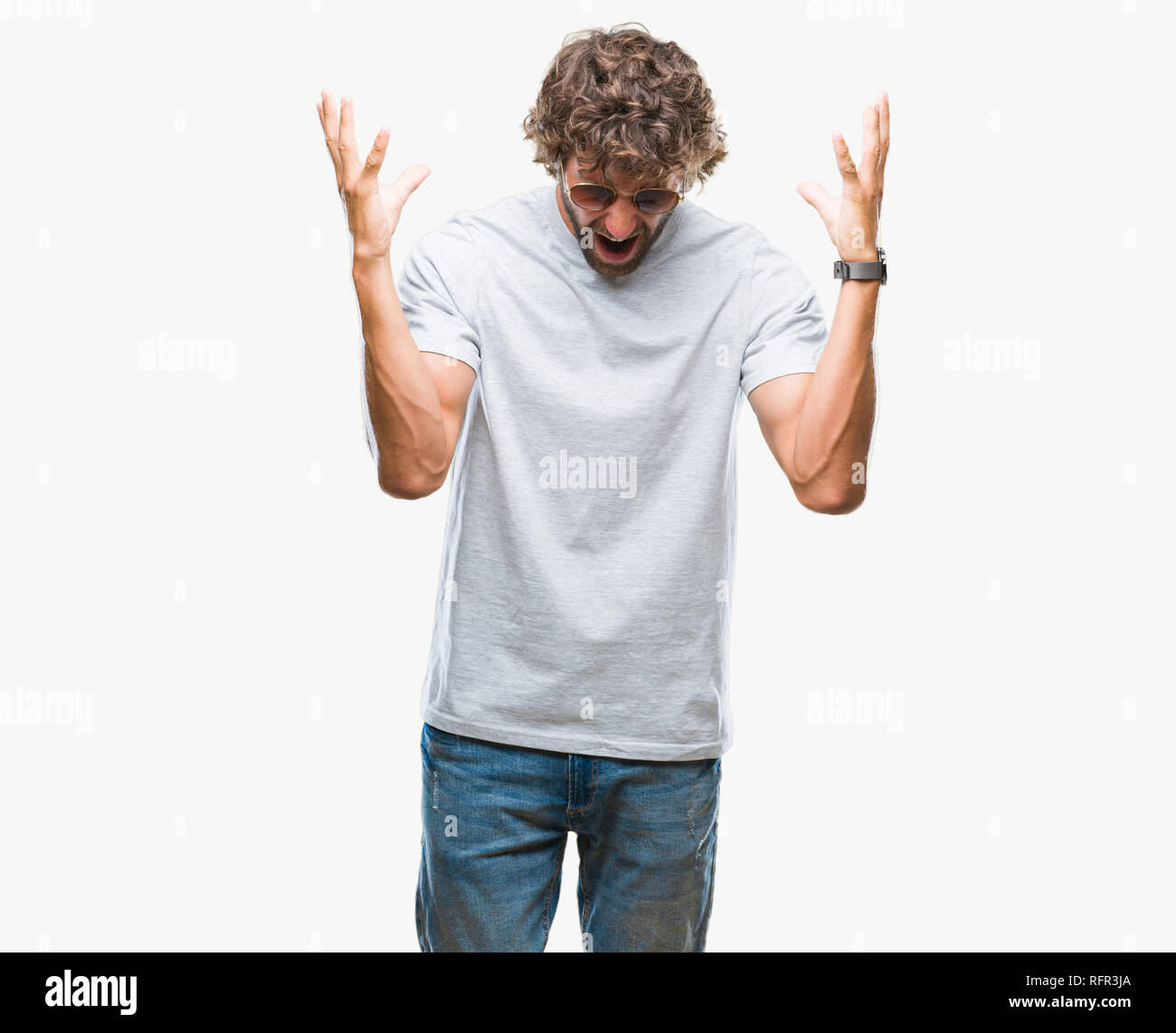Handsome hispanic model man wearing sunglasses over isolated background ...