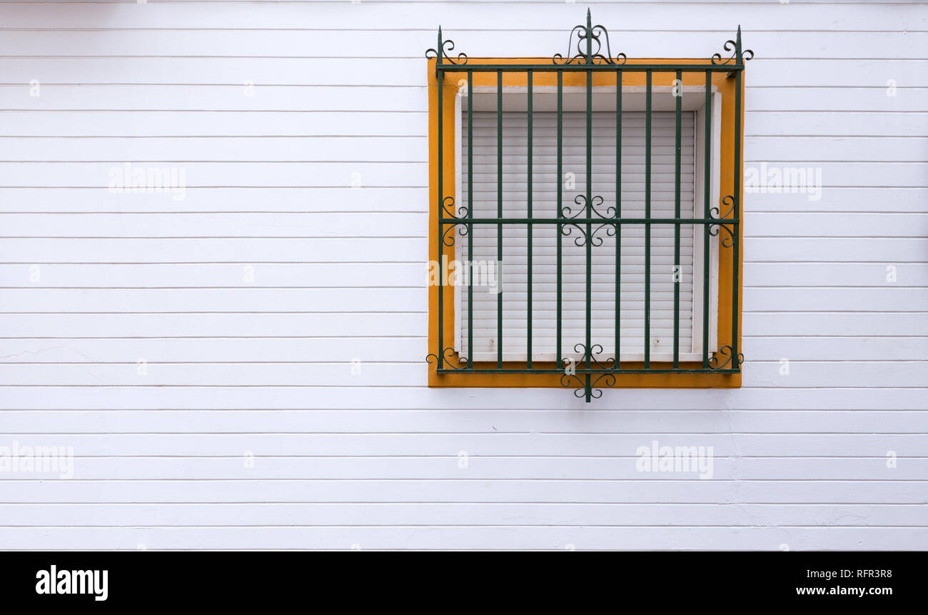 barred window against a white wall Stock Photo - Alamy