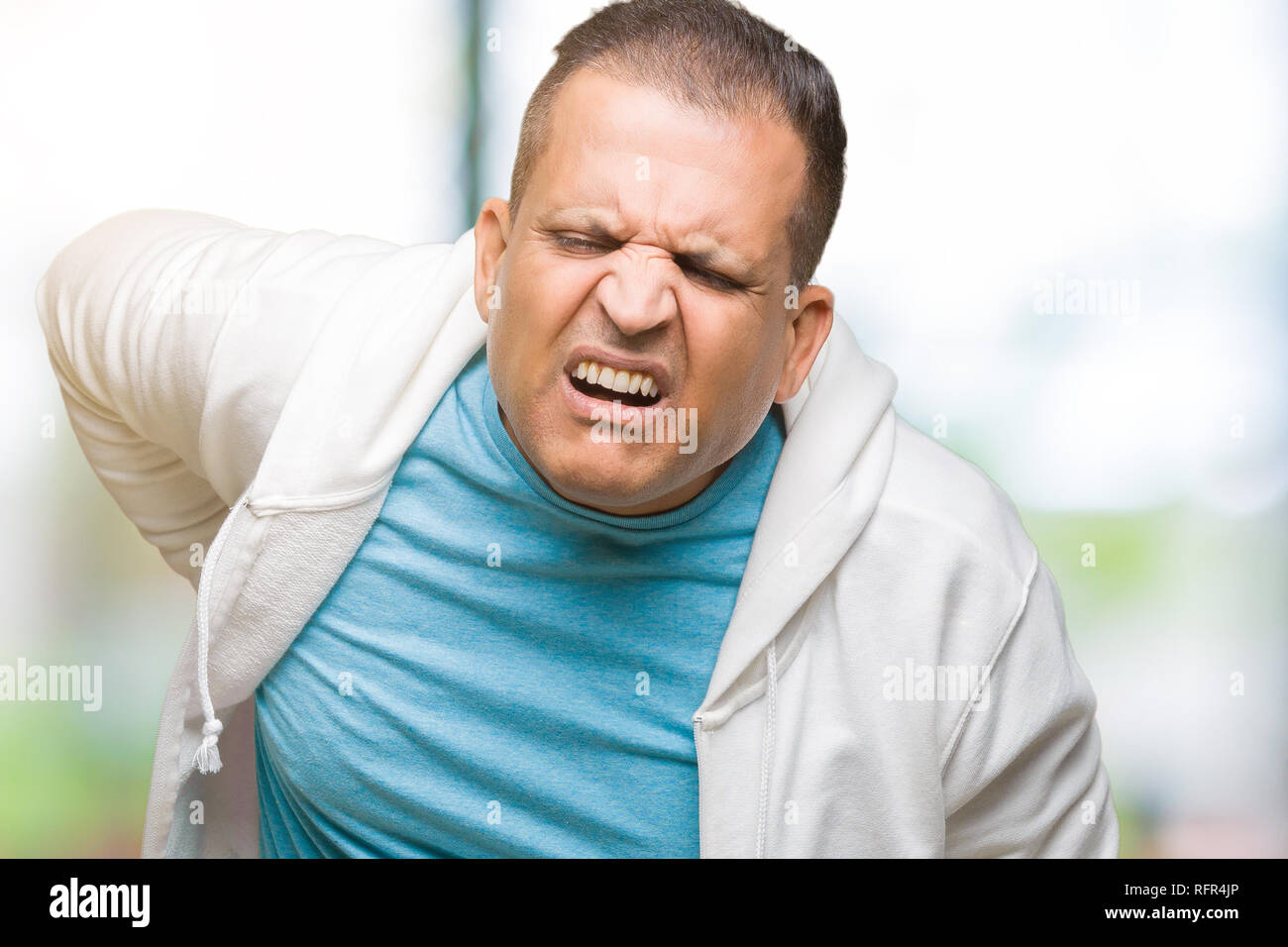 Middle age arab man wearing sweatshirt over isolated background ...