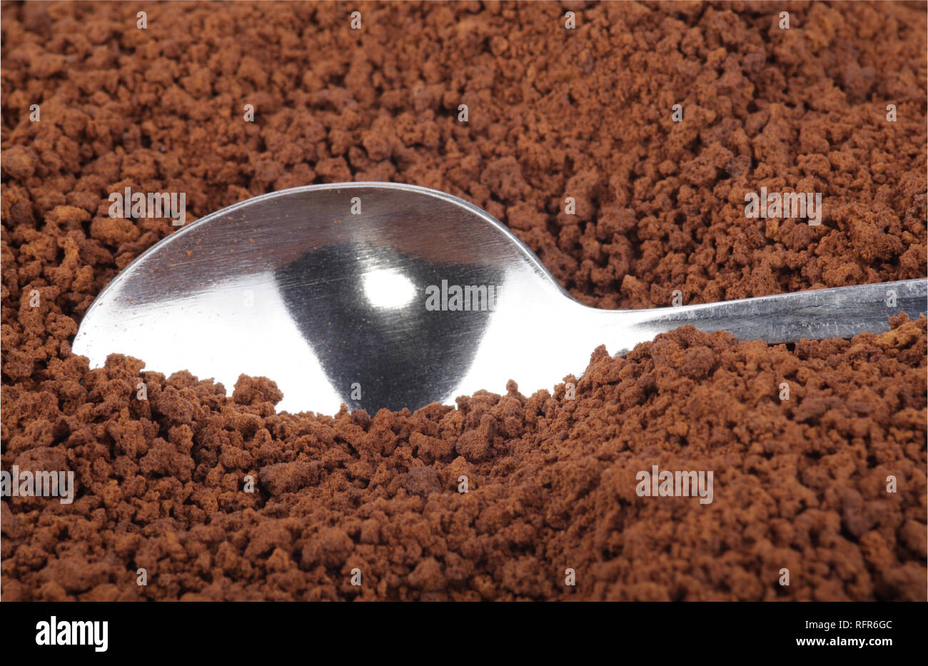 instant coffee background and teaspoon Stock Photo - Alamy