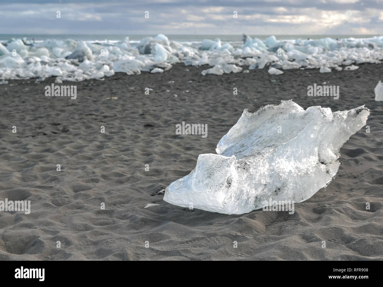 Black and white photo of icebergs on black lava beach at Jökulsárlón ...