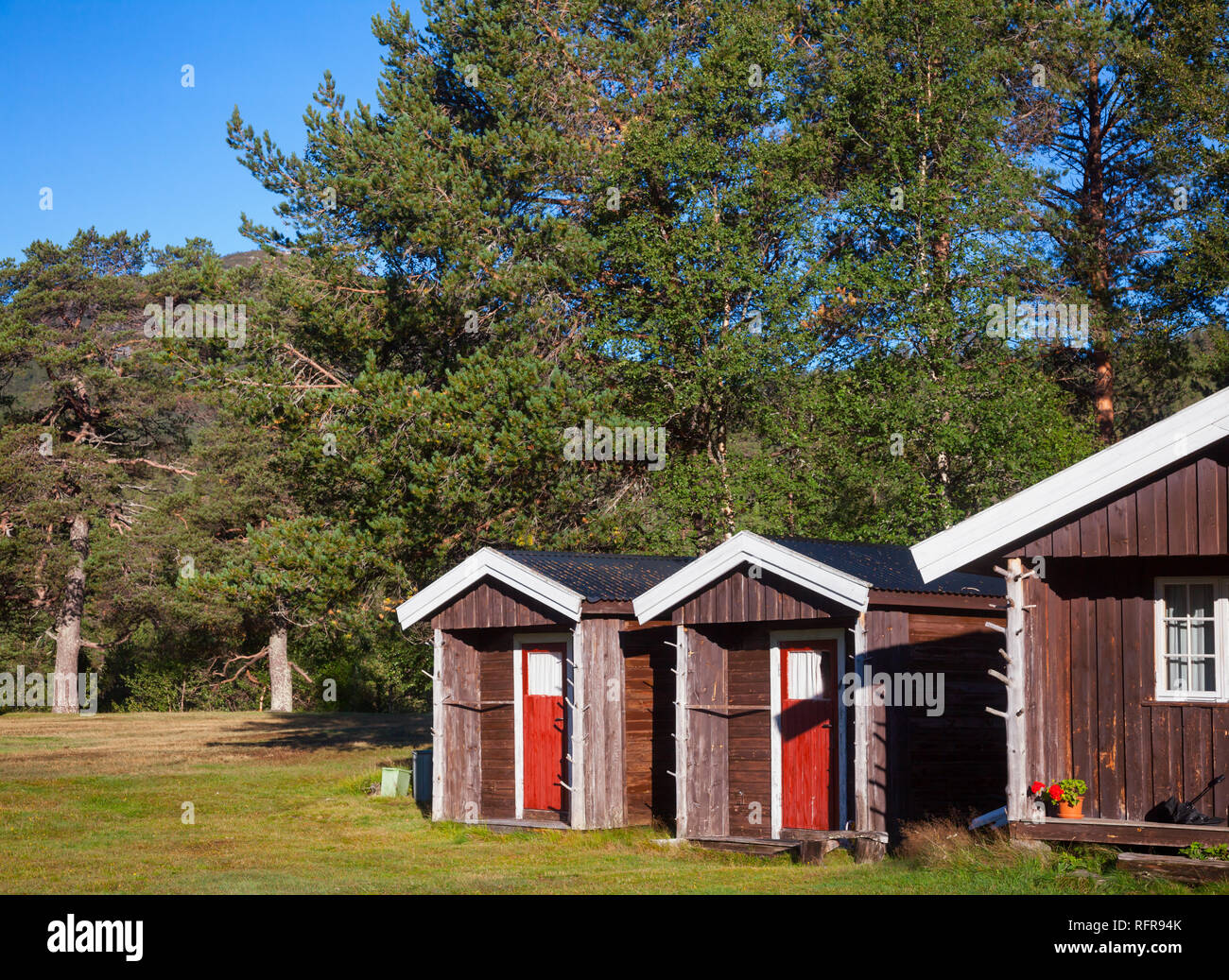 Wooden cabins at norwegian campsite on a bright summer day, Norway ...