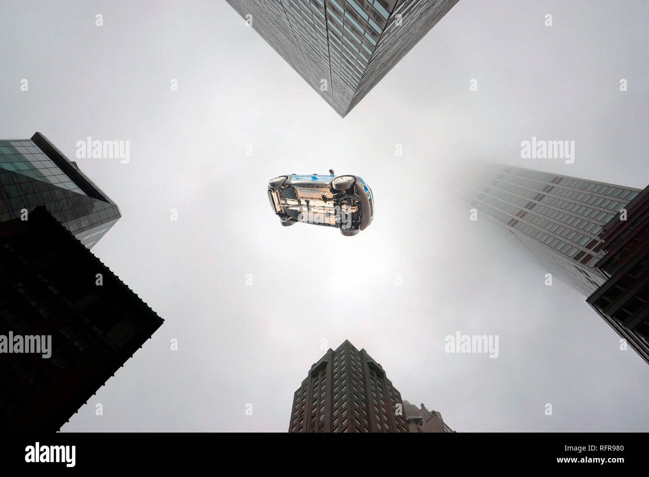 A flying car above the buildings and skyscrapers in New York city in a ...