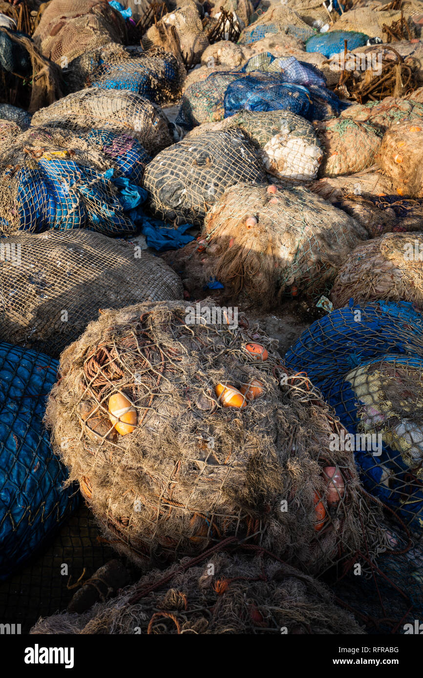 The fishing nets are lying around in the harbour of Essaouira, Morocco ...