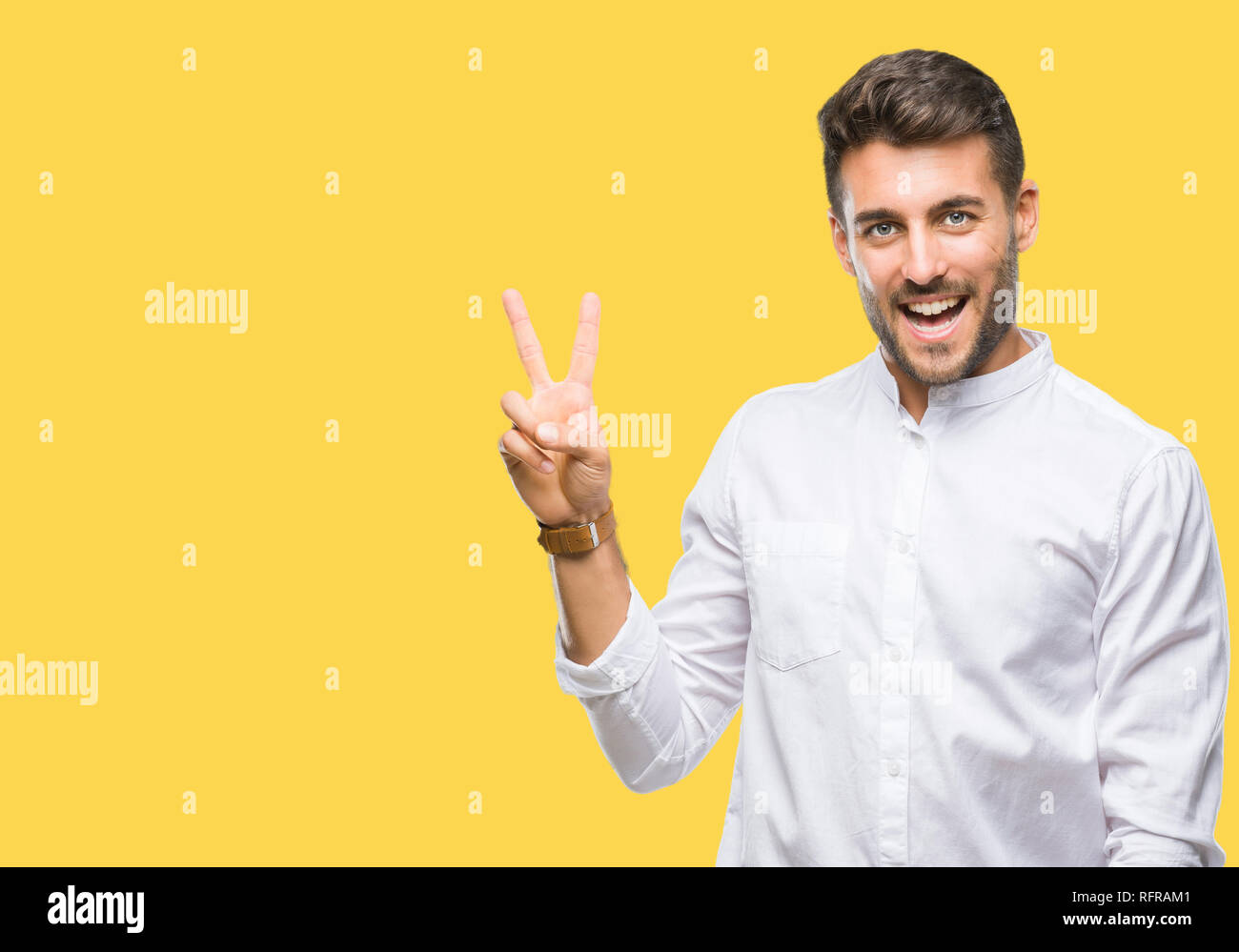 Young handsome man over isolated background smiling with happy face ...