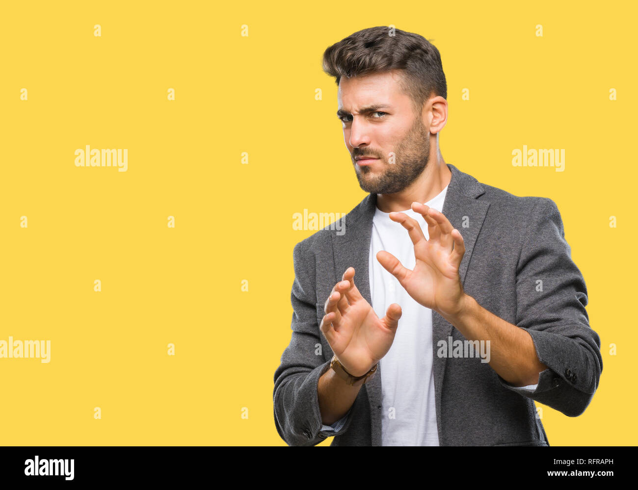 Young handsome business man over isolated background disgusted ...