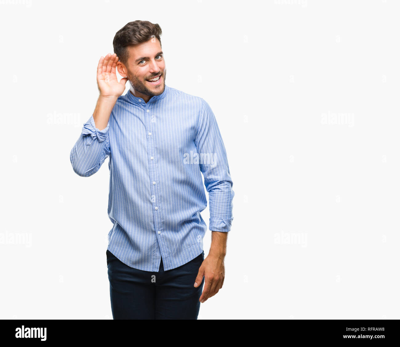 Young handsome man over isolated background smiling with hand over ear ...